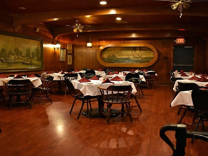 Wood-paneled walls and white tablecloths create that perfect time-capsule dining room where calories don't count and conversations flow as freely as the gravy.