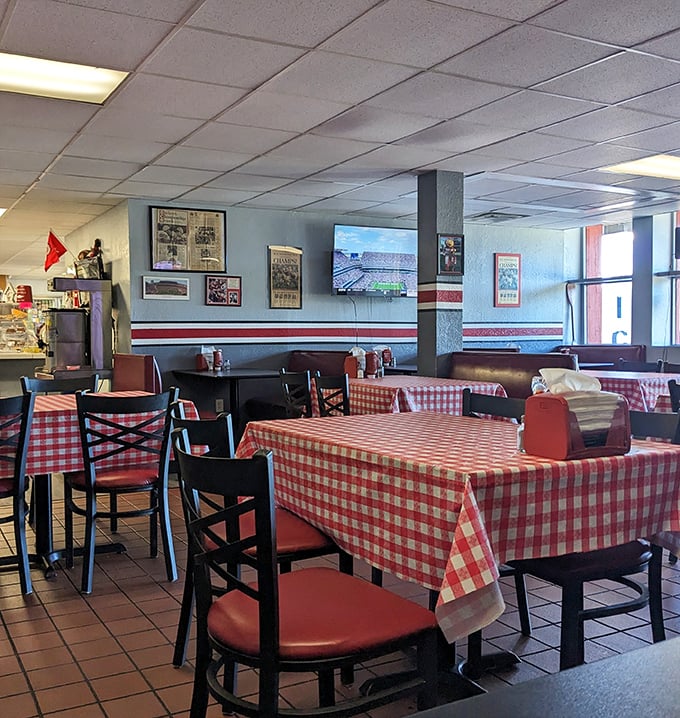 Red and white checkered tablecloths set the stage for Ohio comfort food theater. The walls, plastered with sports memorabilia, tell you exactly where you are—Buckeye country.
