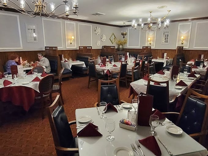 This is a place where you relax and linger. The dining room offers old-school steakhouse charm with wood paneling, white tablecloths, and cozy lighting.