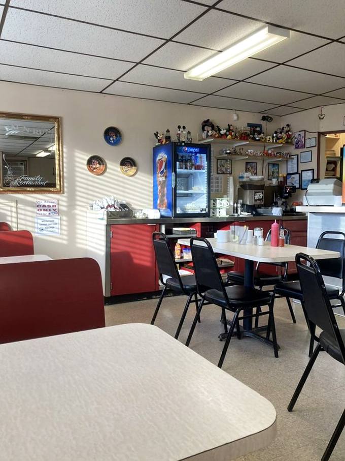 Inside, red counter accents and Disney figurines create that perfect "grandma's kitchen meets local hangout" vibe that no corporate restaurant chain could ever authentically replicate.
