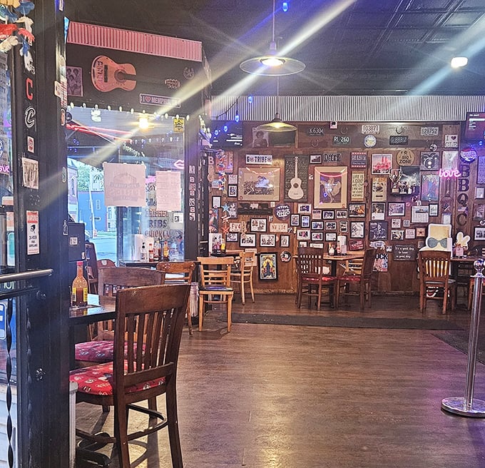 The walls tell stories while you eat, covered in memorabilia that transforms a simple meal into dinner and a show.
