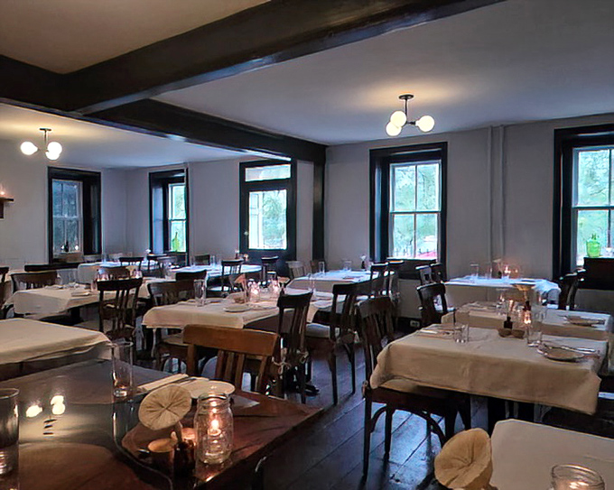 Inside, the stone walls and wood paneling create that perfect time-capsule vibe where calories don't count and coffee refills are endless.