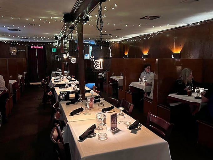 Step inside and you're transported to the era when Sinatra ruled the airwaves. These wood-paneled walls and intimate booths have witnessed countless celebrations and first dates.