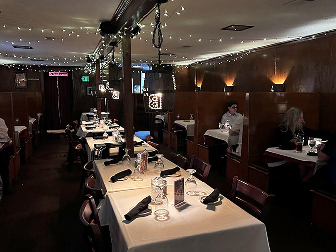 2. Step inside and you're transported to the era when Sinatra ruled the airwaves. These wood-paneled walls and intimate booths have witnessed countless celebrations and first dates.