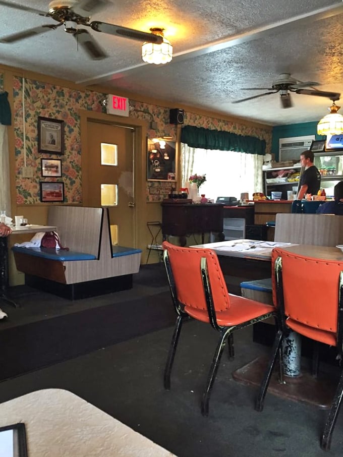 Step inside and time travel to a simpler era. Those orange vinyl chairs have witnessed decades of breakfast conversations and coffee refills.