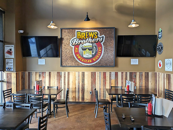 Rustic meets modern in this cozy interior, where reclaimed wood paneling creates the perfect backdrop for burger-induced happiness.