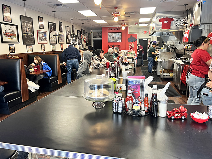 Inside, the counter seating offers front-row tickets to the short-order ballet while vintage memorabilia transforms walls into time capsules.