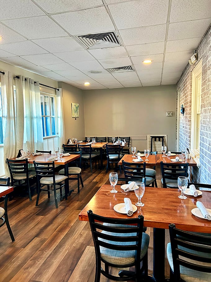 Warm wood tones and exposed brick walls create that rare dining atmosphere&mdash;elegant enough for special occasions but comfortable enough for Tuesday night cravings.