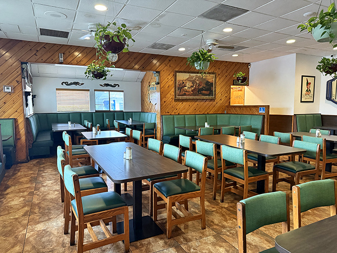 Wood paneling and hanging plants create that perfect time-capsule diner vibe. This isn't retro by design&mdash;it's authentic by survival.