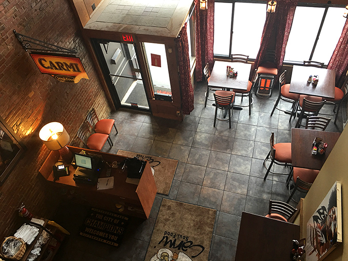 From this bird's-eye view, you can almost hear the quiet conversations and clinking silverware in Carmi's warm, brick-walled dining space.