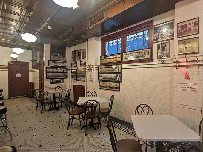 Classic subway tiles and checkered floors create timeless charm where fresh catches meet genuine hospitality.