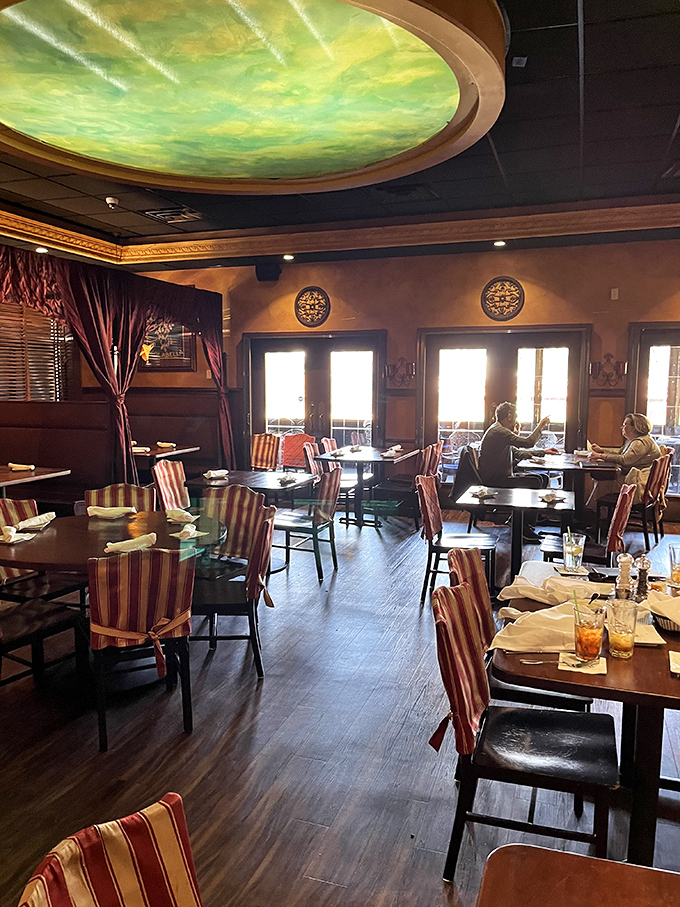 That ceiling! Dining under this Mediterranean-inspired dome feels like you've been transported to Italy without the jet lag.