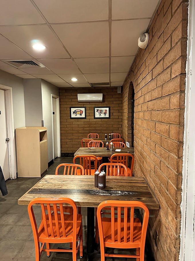 Simple orange chairs and wooden tables say, "We're serious about meat, not furniture." The pig diagrams on the wall serve as both decoration and roadmap to deliciousness.