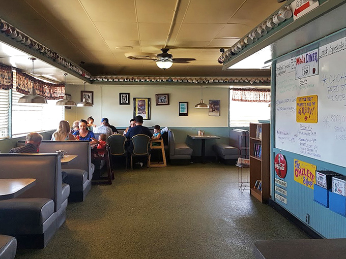 Inside, vinyl booths and nostalgic decor create the perfect backdrop for life's conversations, from first dates to family reunions.