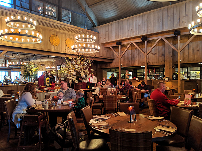 Soaring ceilings, circular chandeliers, and exposed beams create the perfect setting for what might be the most sophisticated barn dinner since Charlotte saved Wilbur.