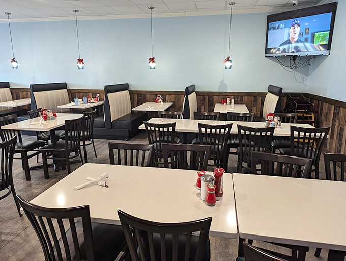 Simple, comfortable interior with wood accents and pendant lighting creates the perfect backdrop for memorable meals and conversations that flow like coffee.
