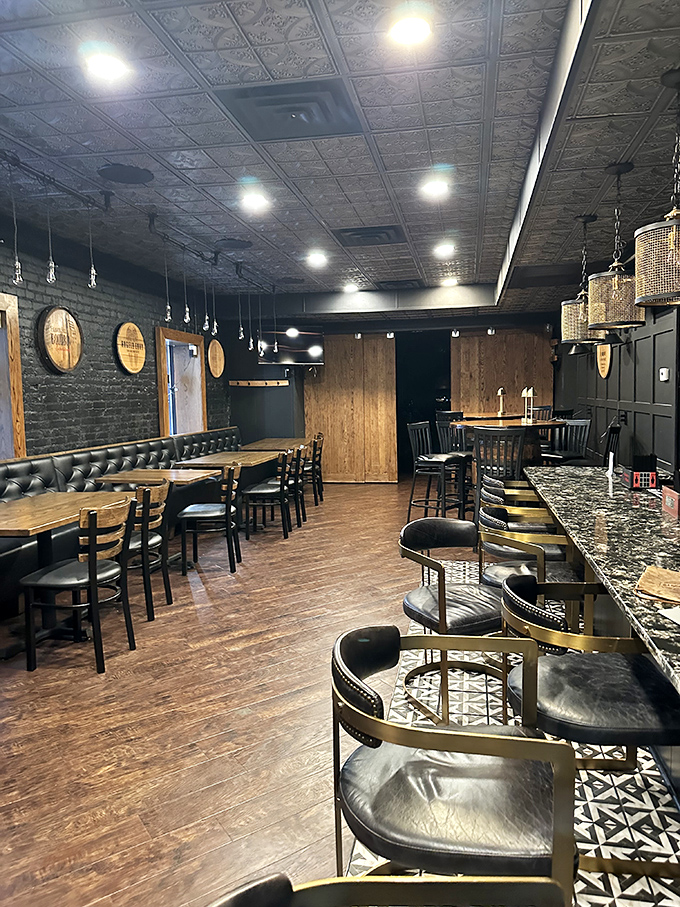 The Barrel Room's sophisticated interior marries rustic bourbon barrel d&eacute;cor with modern elegance&mdash;like your favorite jeans paired with a tailored jacket.