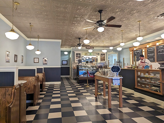Step into a time machine disguised as an ice cream parlor, where the checkered floor and ornate ceiling tiles have witnessed countless "mmms" and "ahhs" from delighted customers.
