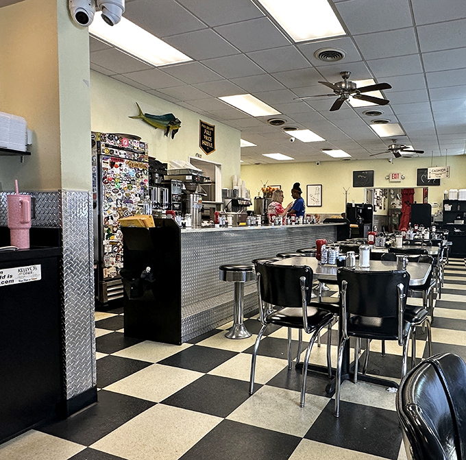 Classic black and white checkered floors meet chrome-trimmed counter stools in this quintessential diner where breakfast dreams come true.