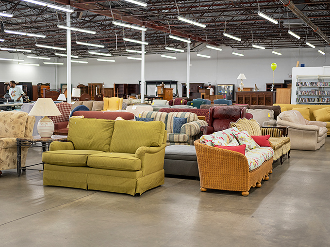 Sunlight streams through the entrance, beckoning bargain hunters into a wonderland where yesterday's castoffs become tomorrow's conversation pieces.