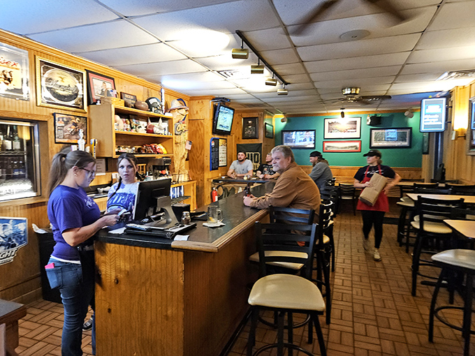Step inside and the 1950s never ended—turquoise booths, checkered floors, and enough neon to guide a plane home on a foggy night.