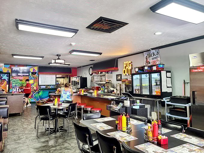 Inside Nick's, time stands deliciously still. Classic diner charm meets Hoosier hospitality, with the "PIG OUT" sign offering sage advice to all who enter.