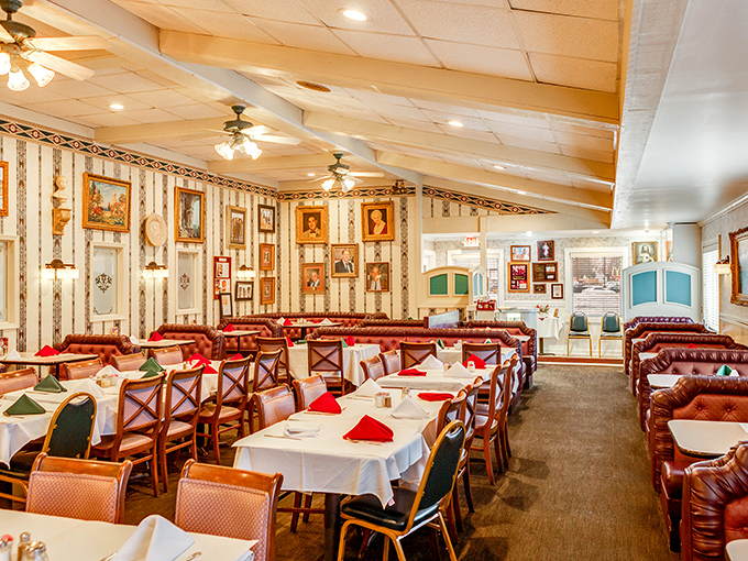 Step inside and you're transported to another era&mdash;family photos line striped wallpaper while red leather booths invite you to settle in for the long, delicious haul.