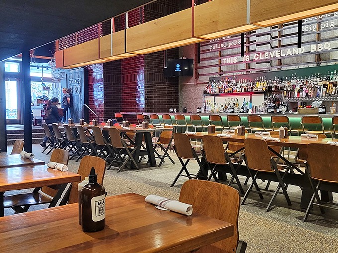 Industrial chic meets Midwest practicality in Mabel's dining room. Those wooden chairs have witnessed countless BBQ-induced food comas.