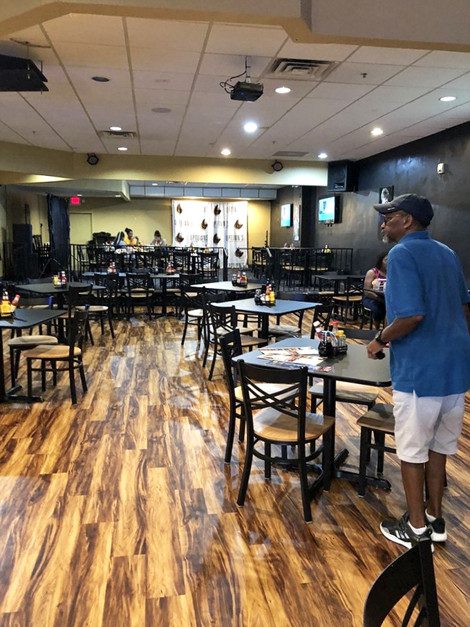 Where comfort food dreams come true. The warm wood floors and inviting atmosphere set the stage for the flavor symphony about to unfold.