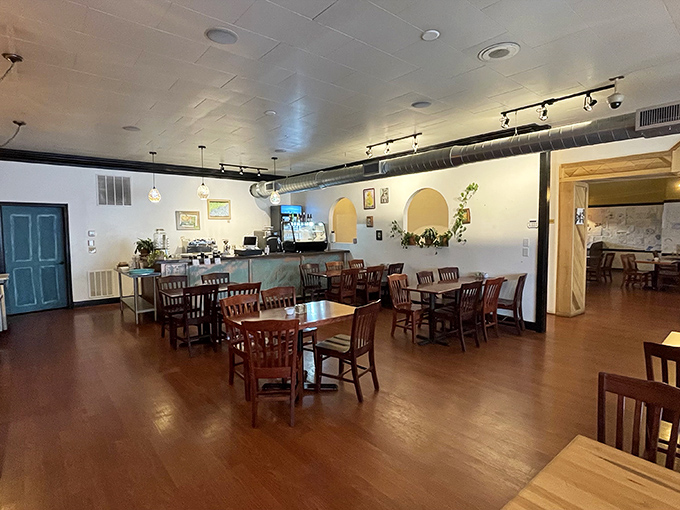 Warm wood tones and clean lines create that rare dining space where you'd happily linger over coffee or plot your next novel.