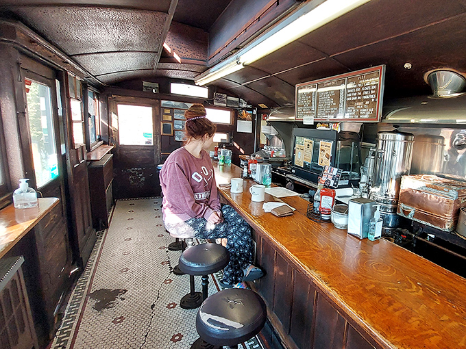 The narrow interior isn't cramped&mdash;it's intimate. Every inch tells a story, every stool has supported decades of hungry Natick residents.