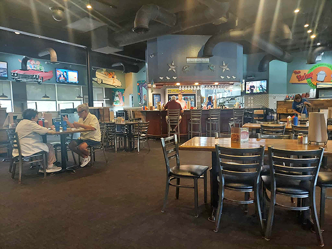 Inside, nautical charm meets no-nonsense dining. The kind of place where conversations flow as freely as the sweet tea.