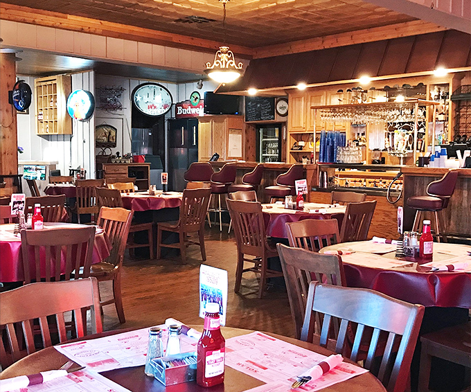 Step inside and you're greeted by warm wood paneling, red tablecloths, and the kind of unpretentious charm that says, "Relax, we've got your comfort food covered."