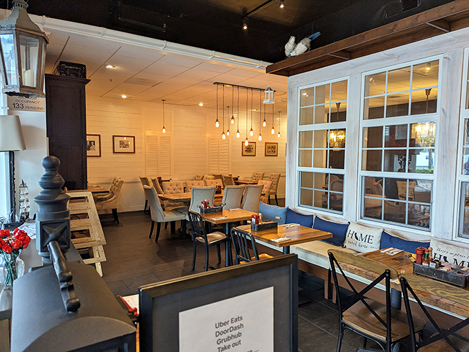 Pendant lights dangle like morning dewdrops over wooden tables, creating that perfect "I could stay here all day" ambiance.