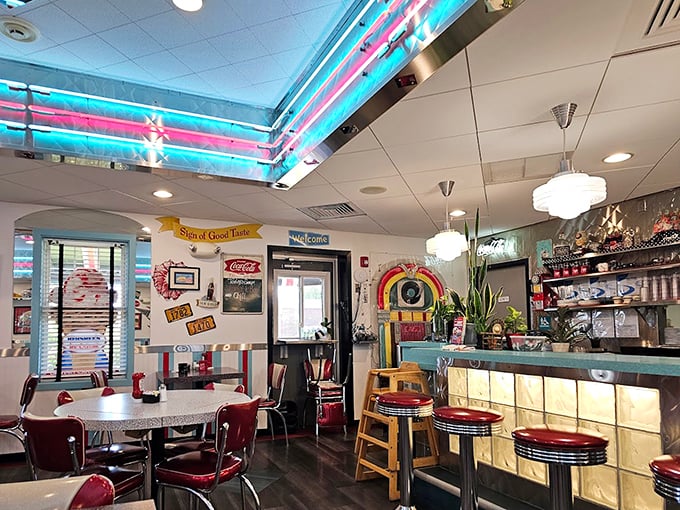 Step inside and suddenly you're Marty McFly without the DeLorean. Those neon lights and chrome details aren't kidding around about the 50s vibe.