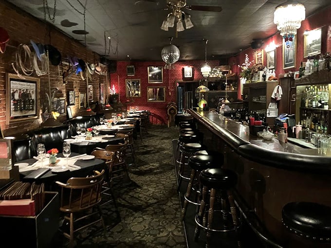 Step inside and time travel to an era when red walls, crystal chandeliers, and proper cocktails were the hallmarks of a serious night out.