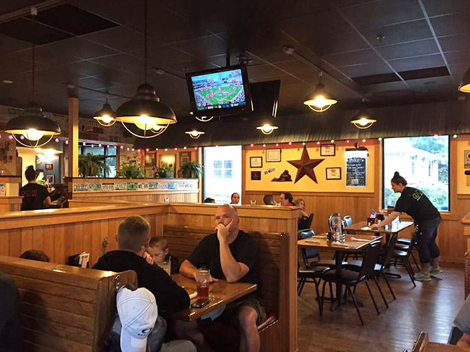 Where barbecue dreams come true. Wooden booths, rustic star decor, and that unmistakable aroma of slow-smoked meat filling the air.