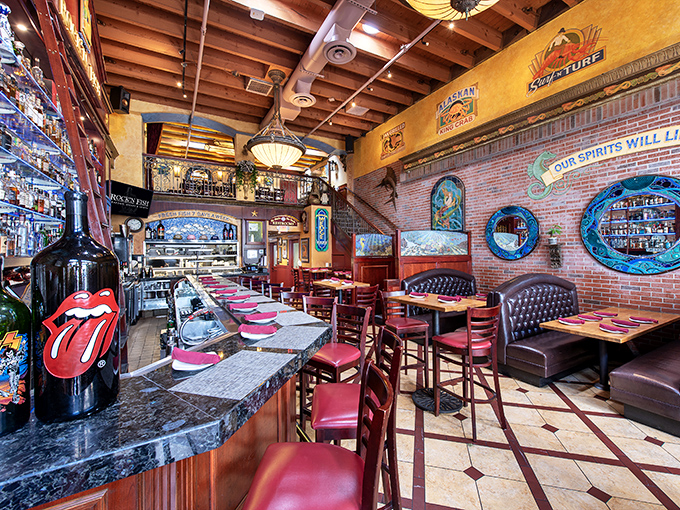 Inside, exposed wooden beams meet nautical charm and rock-and-roll attitude. That Rolling Stones tongue isn't just decoration&mdash;it's a statement of culinary rebellion.