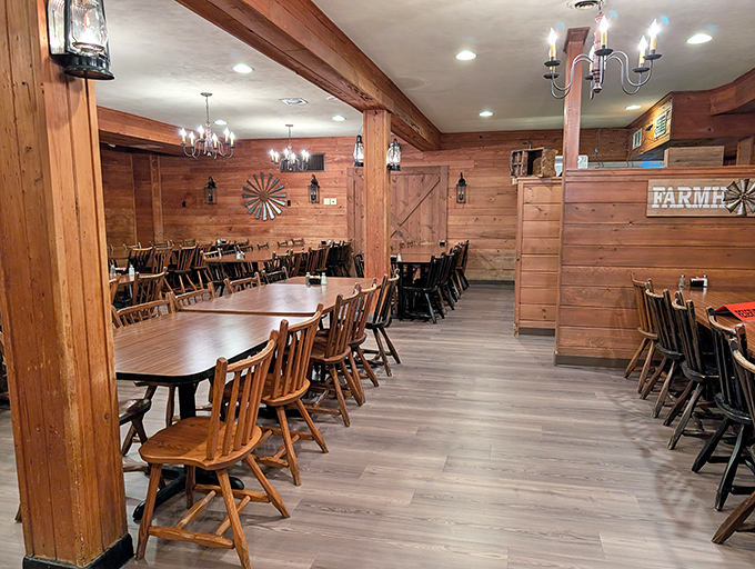 Wooden walls, rustic beams, and farmhouse chandeliers create the perfect backdrop for the serious business of barbecue appreciation.