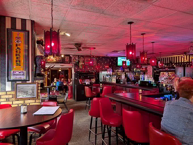 Step into a time machine where red vinyl chairs and moody lighting set the stage for Wisconsin's favorite Friday night ritual.