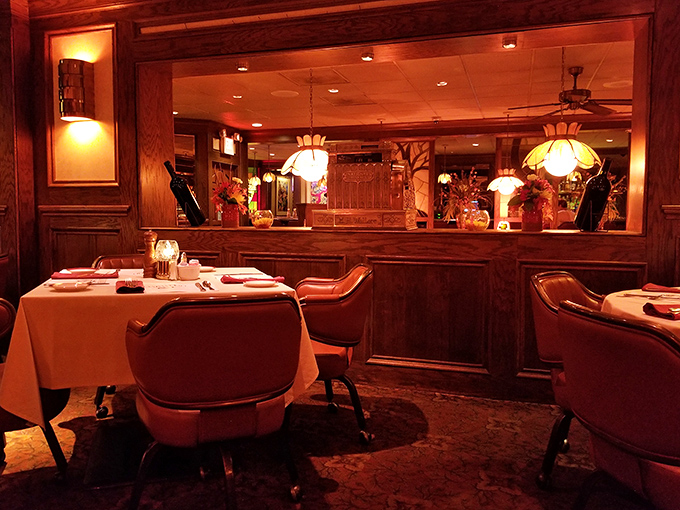 Step into a time machine of taste where rich wood paneling, white tablecloths, and amber lighting create the perfect backdrop for meat-based memories.