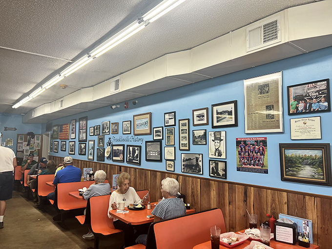 Blue walls adorned with local memories and orange booths filled with regulars &ndash; this isn't d&eacute;cor, it's a community scrapbook serving comfort by the plateful.