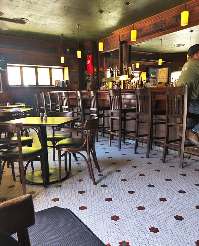 The hexagonal tile floor and warm wooden bar tell stories of countless Philadelphians who've found comfort in this timeless space.