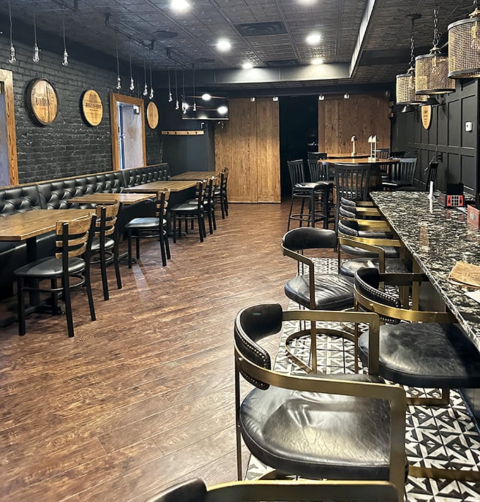 The Barrel Room's warm wood tones and elegant bar stools invite you to linger. Somewhere between rustic charm and sophisticated comfort.