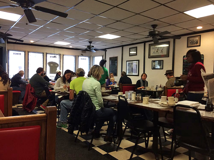 Inside, the classic black and white checkered floor sets the stage for a symphony of clinking plates and friendly chatter that's been the soundtrack of Cleveland mornings for decades.
