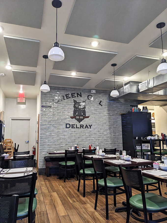 Inside, the owl watches over diners from its gray brick perch, while simple green chairs invite you to settle in for breakfast bliss.