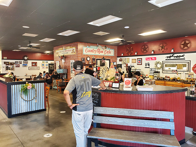 Where Western charm meets breakfast bliss. The red walls, metal stars, and bustling counter create the perfect backdrop for morning magic.