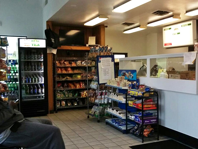 No-frills interior that whispers, "We put our energy into the food, not the decor." The snack racks stand ready for your perfect pairing decision.