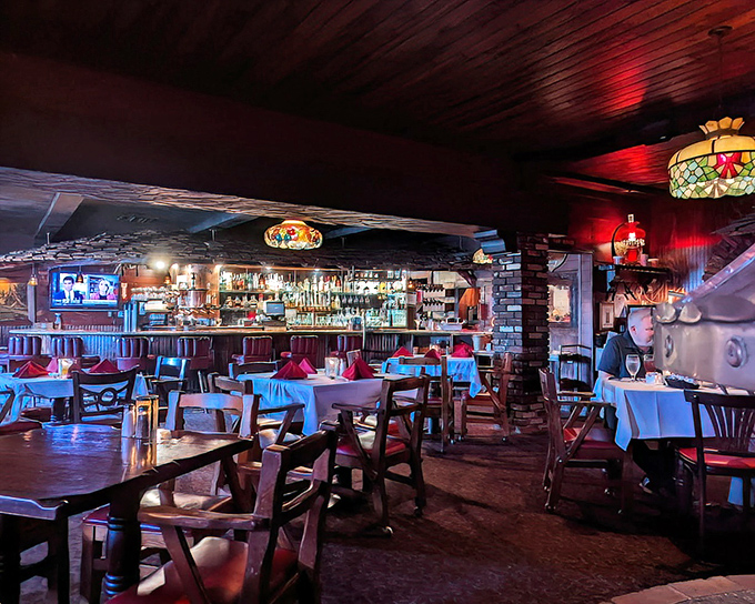 Step inside and discover the timeless charm of red leather booths and classic steakhouse ambiance.