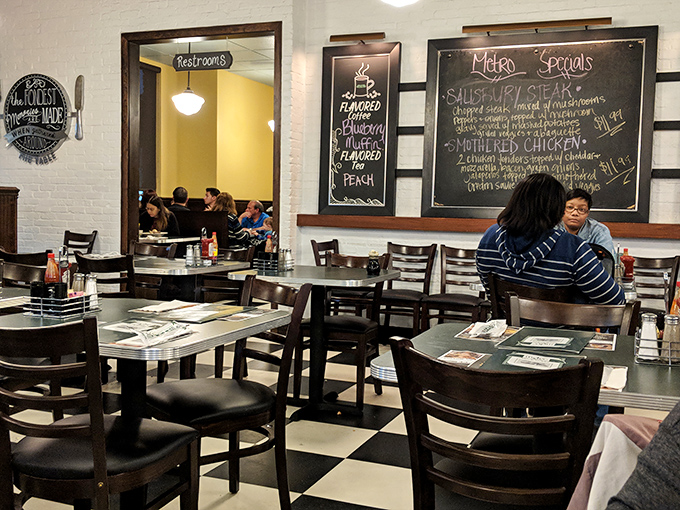Classic black and white checkered floors meet chalkboard specials in this nostalgic yet modern dining space. Comfort with a side of conversation.